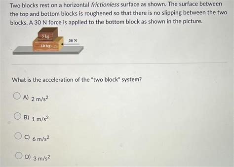 Solved Two Blocks Rest On A Horizontal Frictionless Surface