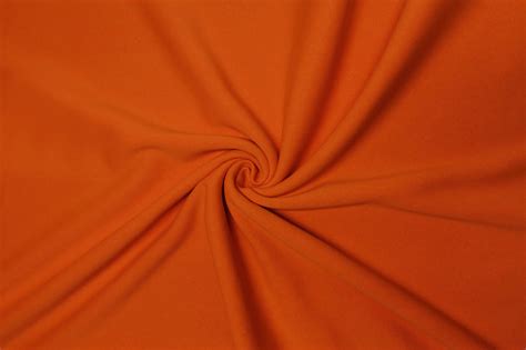 빨간색 구겨진 또는 물결 모양의 직물 텍스처 배경 추상 린넨 천 부드러운 파도 사틴 실크 코튼의 주름 매끄러운 우아한 실크 또는 아틀라스 고급 천 감촉 침구 시트 또는 담요