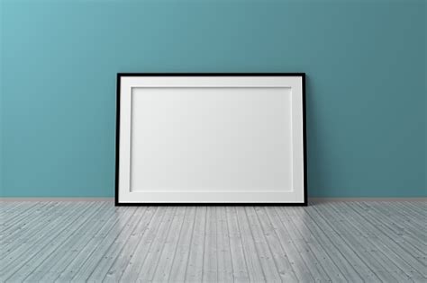 파란색 벽 옆에 있는 방에 서 있는 커다란 수평 검정 프레임 1개 0명에 대한 스톡 사진 및 기타 이미지 0명 A4 용지