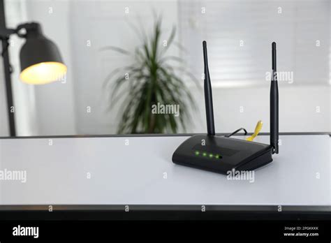 Modern Wi Fi Router On Table Indoors Space For Text Stock Photo Alamy