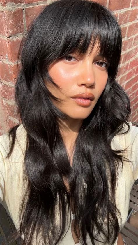 50 Beautiful Long Shag Haircuts For Effortless Style Sleek Raven Shag