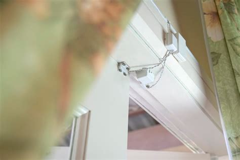 Premium Photo Magnetic Alarm Sensor Installed On Door For Home Security