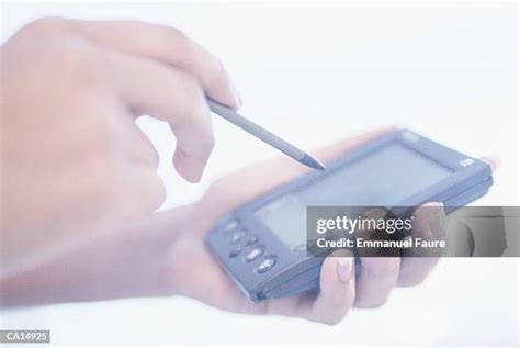 Handheld Device Photos And Premium High Res Pictures Getty Images