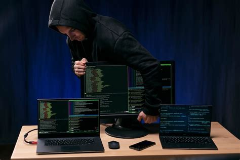 Premium Photo Medium Shot Hacker Holding Monitor