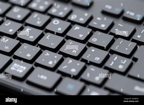 Close Up Of Computer Keyboard Alphabetics And Japanese Hiragana Typing