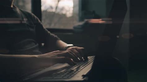 A Programmer Is Typing New Lines Of Html Code Laptop Closeup Working