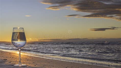 A Glass At Sunset On A Beach Stock Image Image Of Dawn Nature