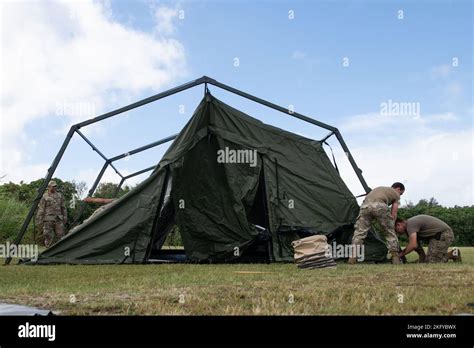 U S Air Force Airmen Assigned To The 18th Wing Set Up A Tent During An