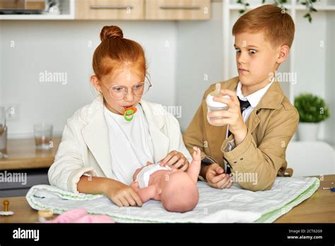 Changing Diapers Hi Res Stock Photography And Images Alamy