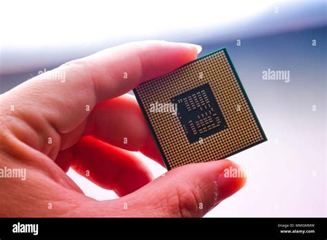 Technology Cyber Electronic Concept Cpu Microprocessor Chip In Hand Stock Photo Alamy