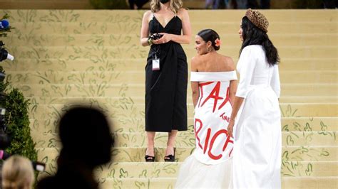 AOC Under Investigation For Met Gala Dress Reading Tax The Rich BBC News