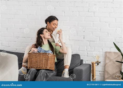 Joyful Lesbian Couple Walking Sea Shore On Sunny Day Happy Girls