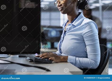 Employee Monitoring And Analyzing Server Room Metrics Stock Image