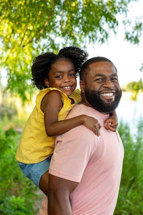 Father And Daughter Smiling And Laughing Outside Stock Image Image
