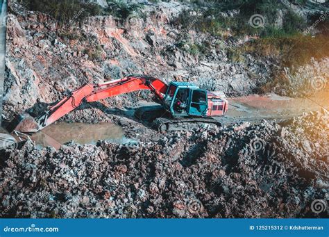 Red Backhoe Or Excavator Equipment On Construction Site Stock Photo Image Of Large Bulldozer