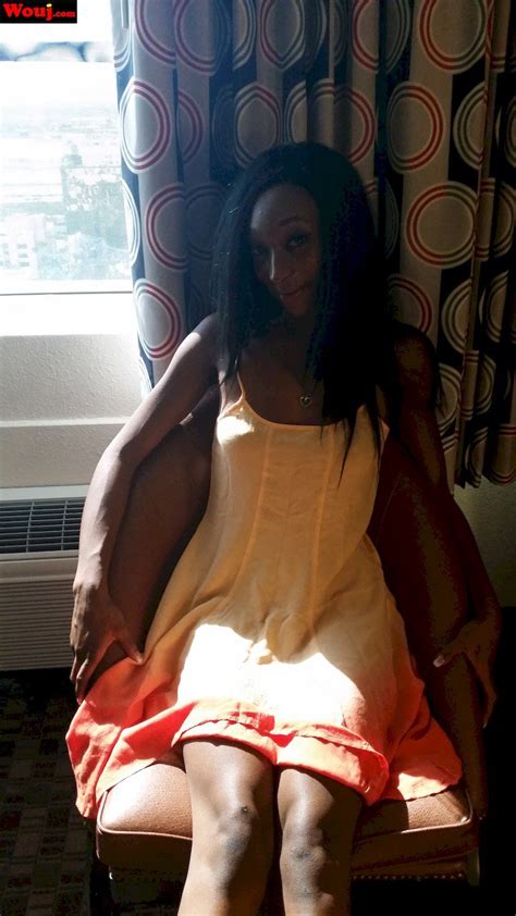 Slim Ebony Chick Turns Around And Shows Her Nice Round Butt Photos