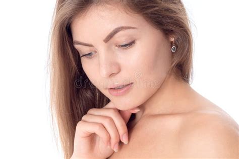 Portrait Of A Beautiful Girl Without Makeup Which Lowered Her Eyes Down