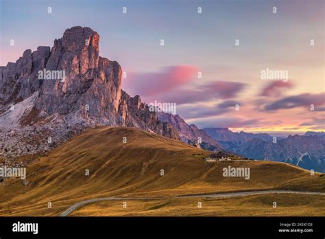 It Is Autumn In The Dolomites And A Beautiful Sunrise On The Giau Pass