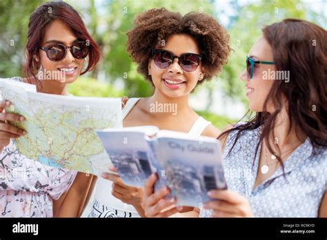 Women With Map And City Guide On Street In Summer Stock Photo Alamy