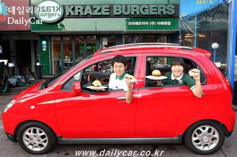 Gm대우 마티즈 출시 10주년 이벤트 실시 뮤지컬 공연 마티즈 버거 판매해 ~데일리카