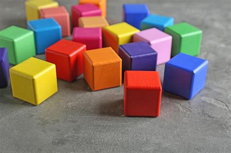 Premium Photo Color Cubes On Grey Background Unity Concept