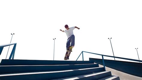 Premium Photo Skateboarder Doing A Trick Isolated On White