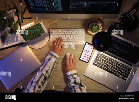 Female Programmer Working With Computer In Office At Night Top View