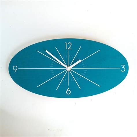 Teal Oval Wooden Wall Clock With Neutra Numbers Unique Colourful Mid