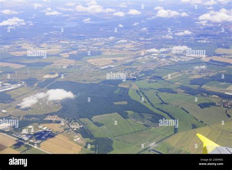 Aerial View Of Fields And Green Lands From A Window Of A Window Stock