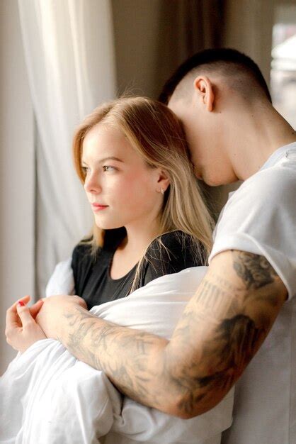Premium Photo Couple Hugging At Home