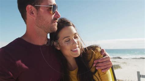 Circular Animation Over Couple Embracing On Beach Stock Footage Video Of Affectionate