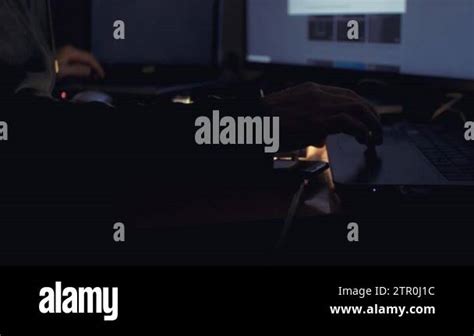 Male Hand Of Hacker In Hood Cracking Code Using Computers In Dark Room Stock Video Footage Alamy