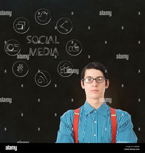 Nerd Geek Businessman With Computer Social Media Network Icons On Blackboard Background Stock