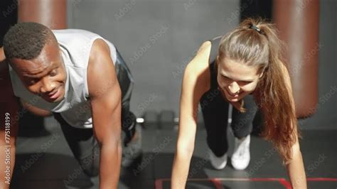 In The Gym People Do Squats For Training Exercise And Workout Class