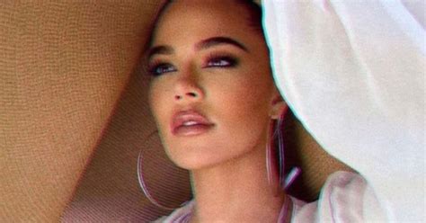 khloe kardashian stuns in the world s smallest string two piece in a provocative beach photo