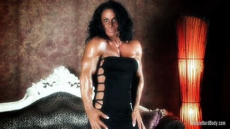 Bodybuilder Debbie Bramwell Shows Her Big Ass While Flexing Her Muscles