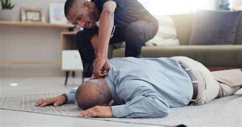 Fall Accident And Senior Man With Nurse And Emergency At Home With