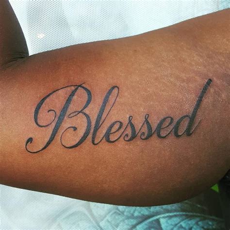 Blessed In Cursive Writing Tattoo