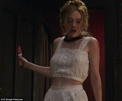 Dakota Fanning Battles A Face Full Of Hair In Gusty Nyc Daily Mail Online