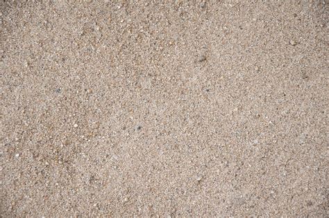 Sable Sur Le Fond De La Plage Vue De Dessus Photo Premium