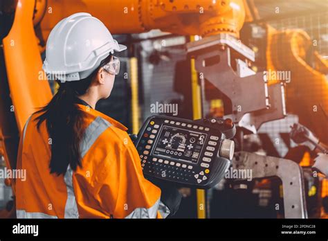 Engineer Team Service Robot Welding Working In Automation Factory