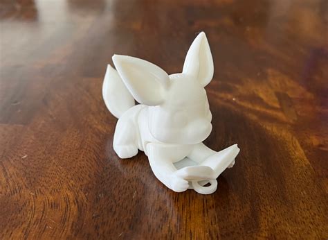 Articulated Eevee Keychain With Book By Drewbot88 Makerworld