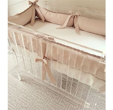 Pretty Crib With Two Pillows