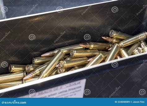 Black Container Box With A Pile Of Copper Bullets Inside Stock Image