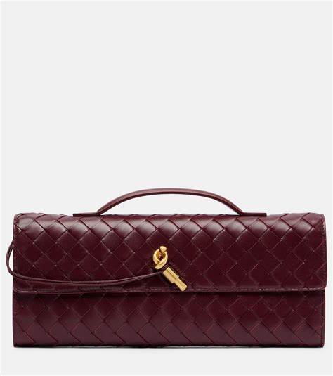 Andiamo Intrecciato Leather Clutch In Burgundy Bottega Veneta Mytheresa