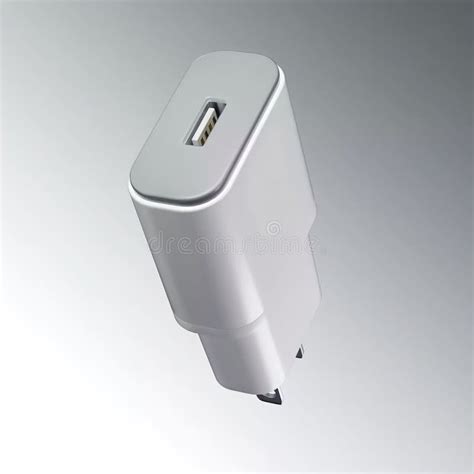 A Closeup View Of A White Usb Phone Charger Adapter With A Plug Isolated On A Gray Background