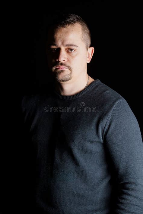 Introspective Portrait Of A Man Against A Dark Background Stock Image Image Of Emotional