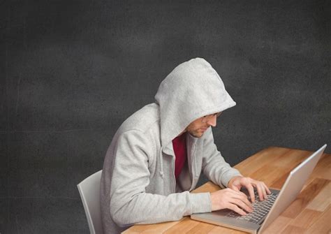 Premium Photo Man Using Laptop On Wooden Table