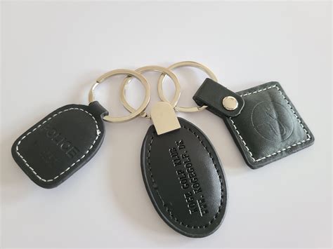 Customized Shape Nfc 13 56mhz Key Chain Rfid Leather Keys Fobs For Access Control Hotel Ving