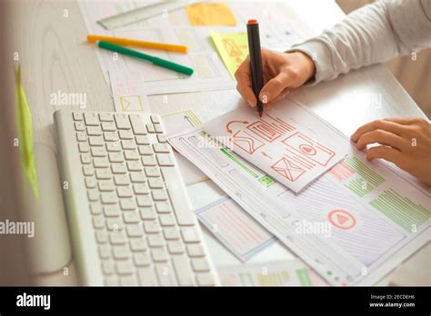 Website Designer Creates A Sketch Application Developing A Project Drawing An Interface Mockup